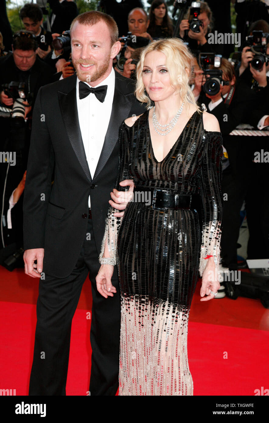 Singer Madonna and her husband director Guy Ritchie arrive on the red ...