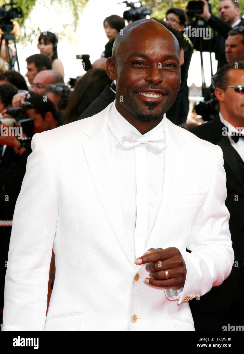 Jimmy Jean Louis arrives on the red carpet before the world premiere of ...