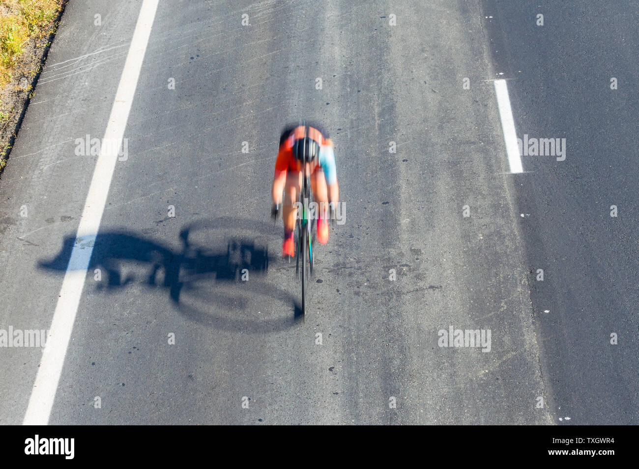 Cycling Cyclist road race riding overhead photo of motion speed blur ...