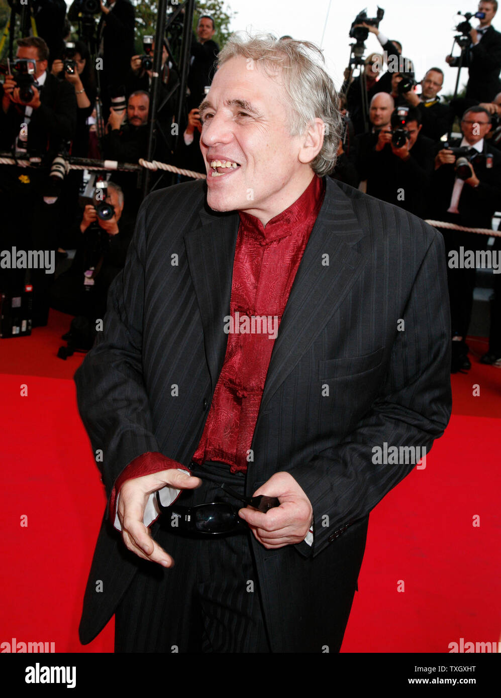 Director Abel Ferrara arrives on the red carpet before a screening of ...