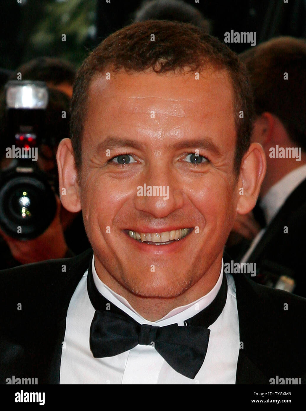 Director Dany Boon arrives on the red carpet before a screening of the ...