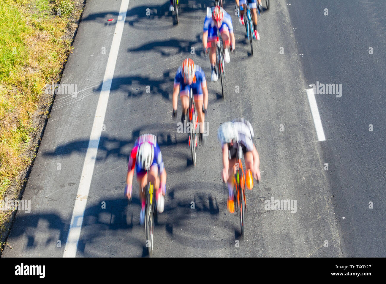 Cycling Cyclists road race riding overhead photo of motion speed blur ...