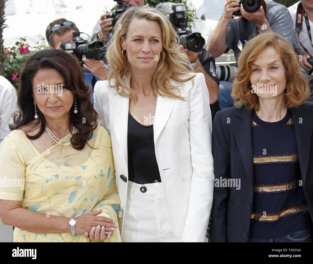 Jury members Sharmila Tagore III (L), Robin Wright Penn (C) and jury ...