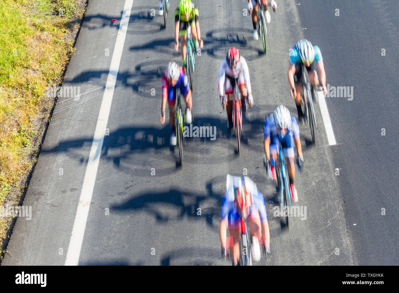 Cycling Cyclists road race riding overhead photo of motion speed blur ...
