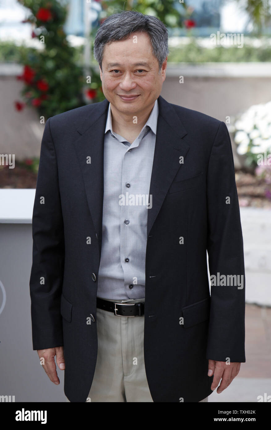 Director Ang Lee arrives at a photocall for the film "Taking Woodstock ...