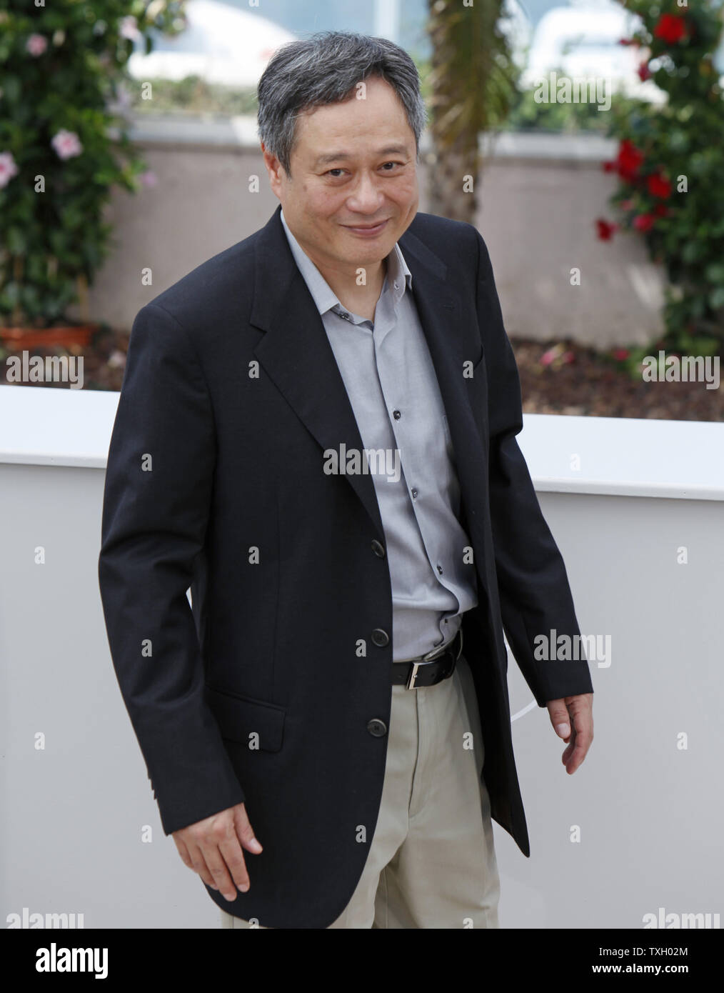 Director Ang Lee arrives at a photocall for the film "Taking Woodstock ...