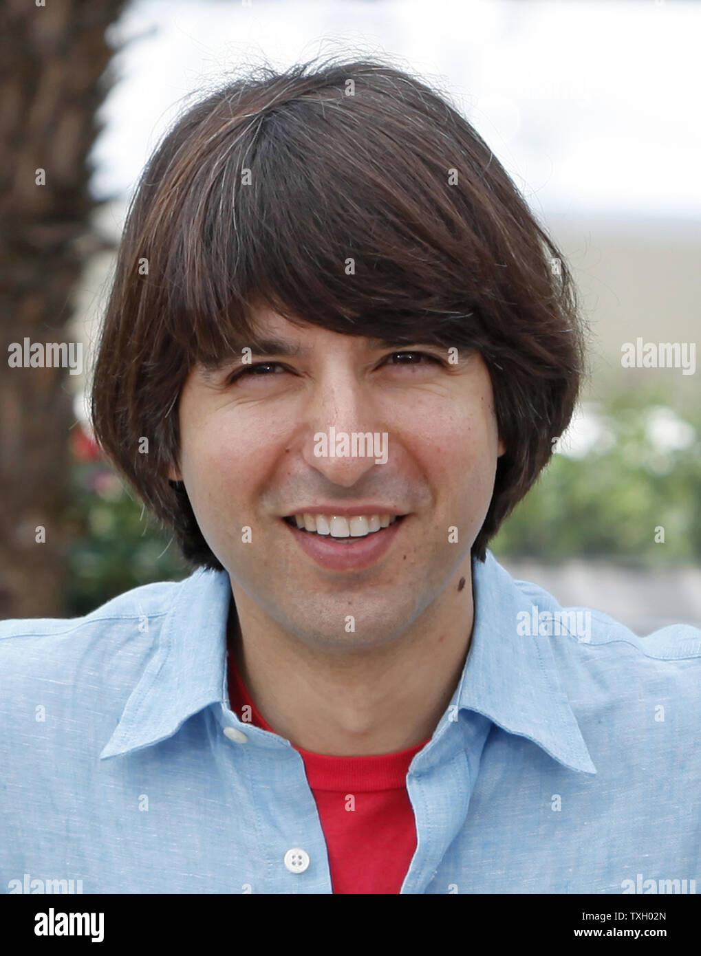 Actor Demetri Martin arrives at a photocall for the film "Taking ...
