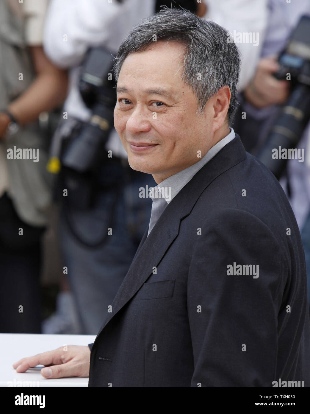Director Ang Lee arrives at a photocall for the film "Taking Woodstock ...