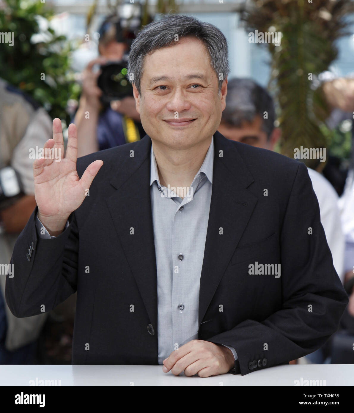 Director Ang Lee arrives at a photocall for the film "Taking Woodstock ...