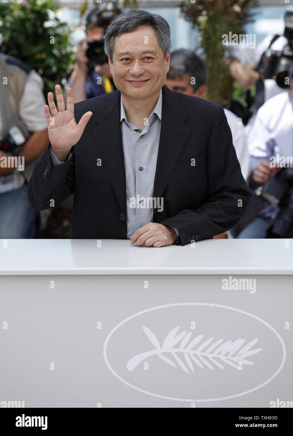 Director Ang Lee arrives at a photocall for the film "Taking Woodstock ...