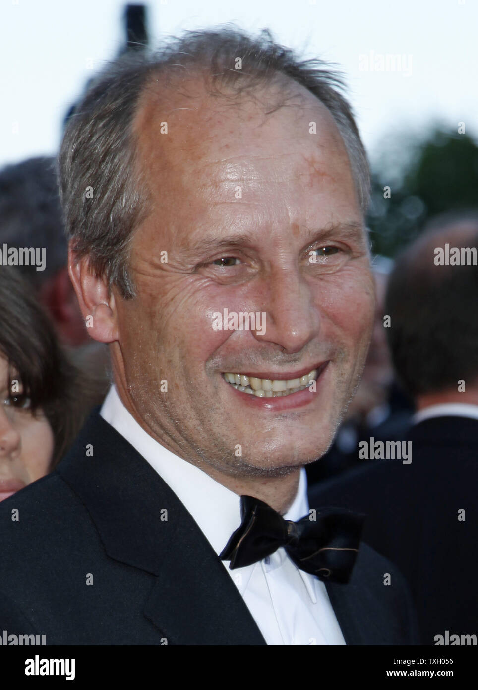 Actor Hippolyte Girardot arrives on the red carpet before a screening ...