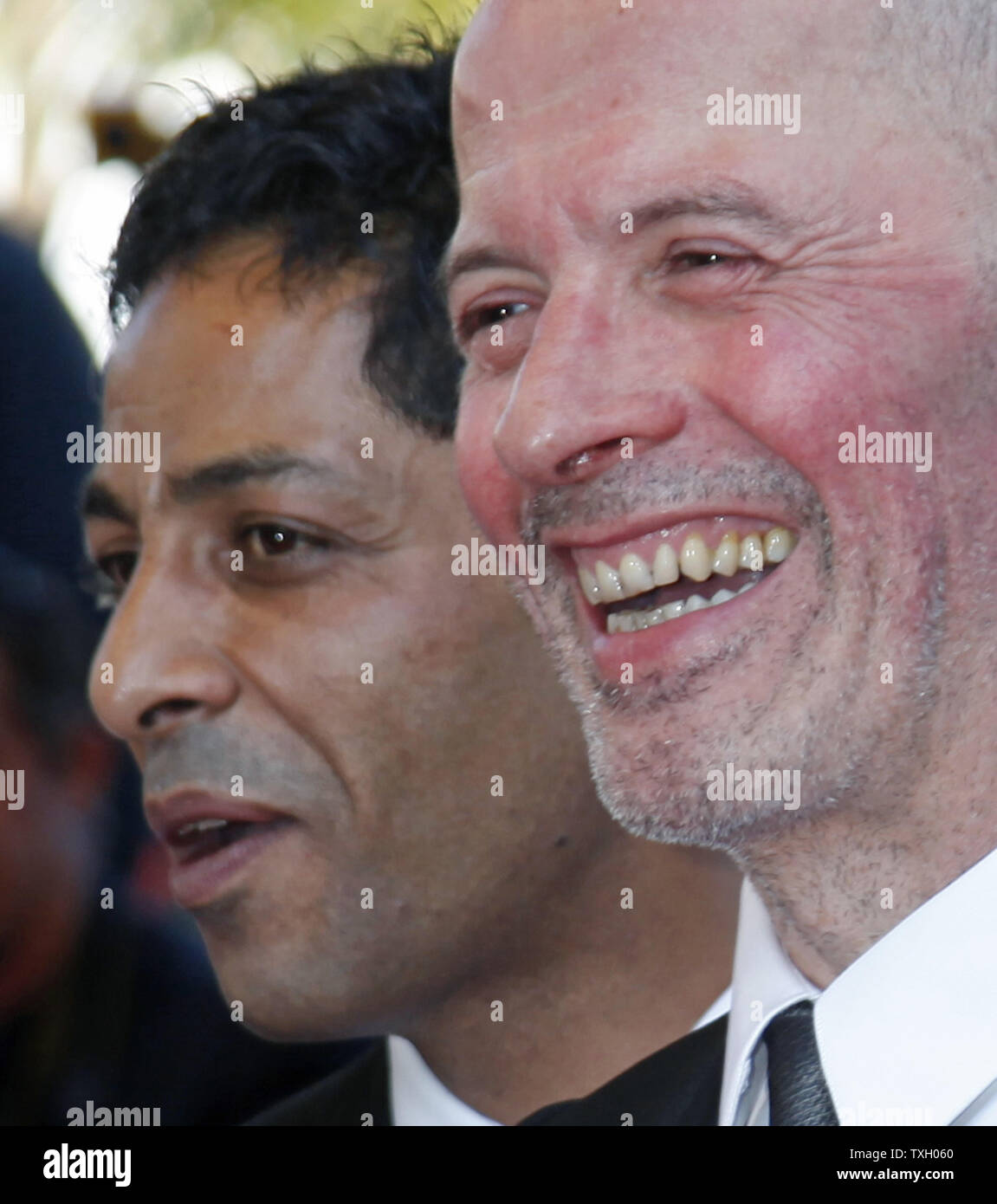 Actor Hishem Yacoubi (L) and director Jacques Audiard arrive on the red ...