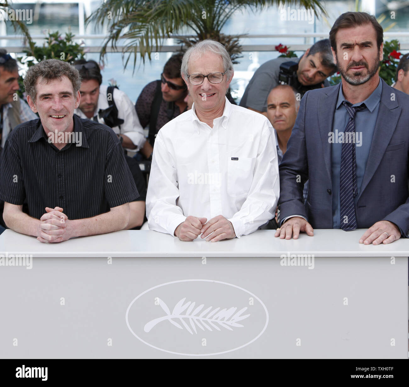 Actor Steve Evets (L), director Ken Loach (C) and actor Eric Cantona ...