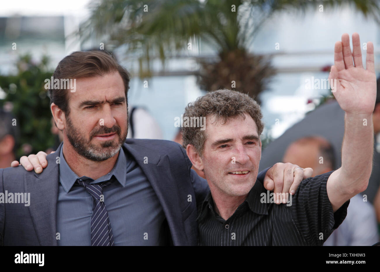 Actors Steve Evets (R) and Eric Cantona arrive at a photocall for the ...
