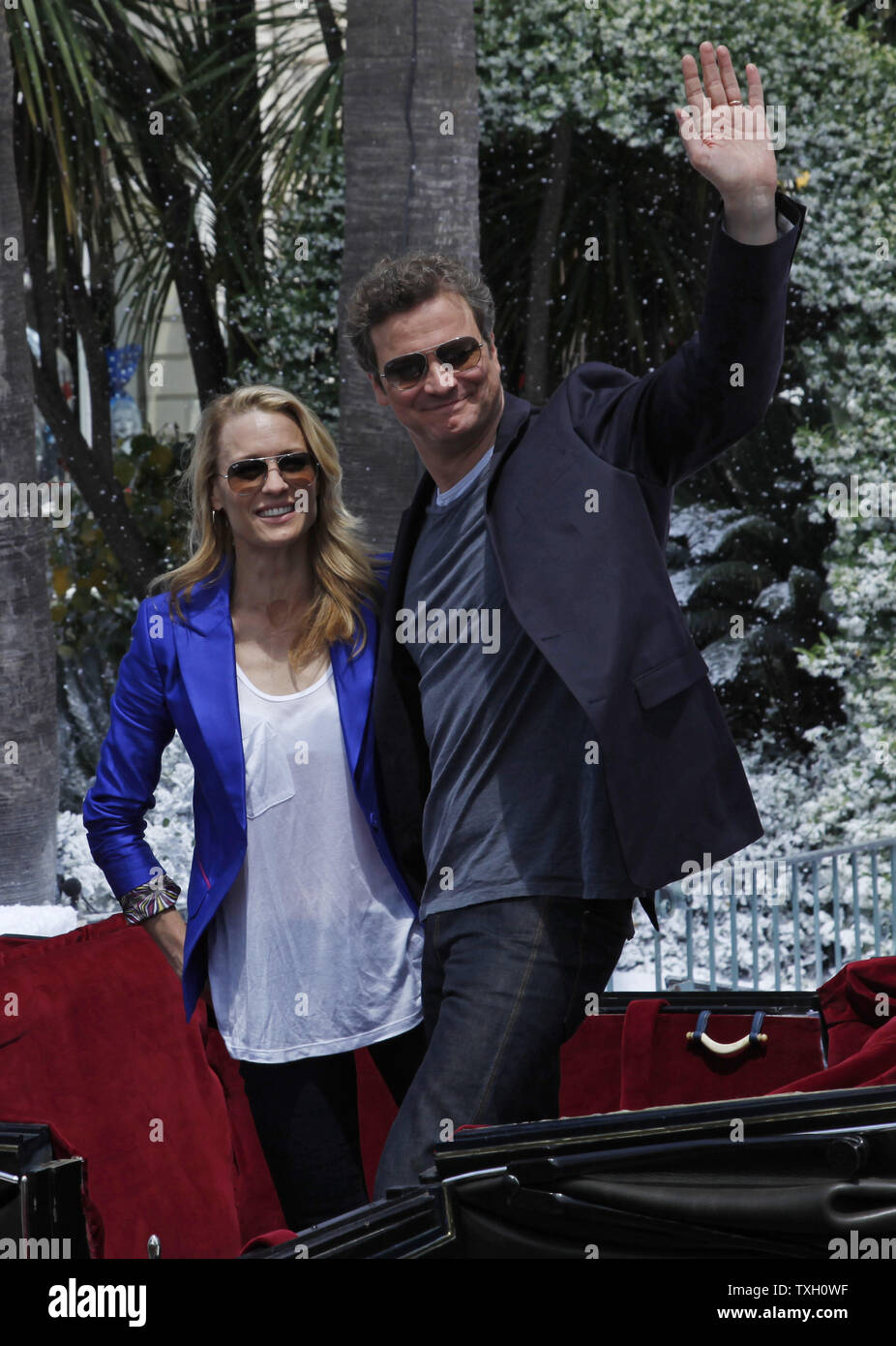 Actress Robin Wright Penn and actor Colin Firth arrive at a photocall ...