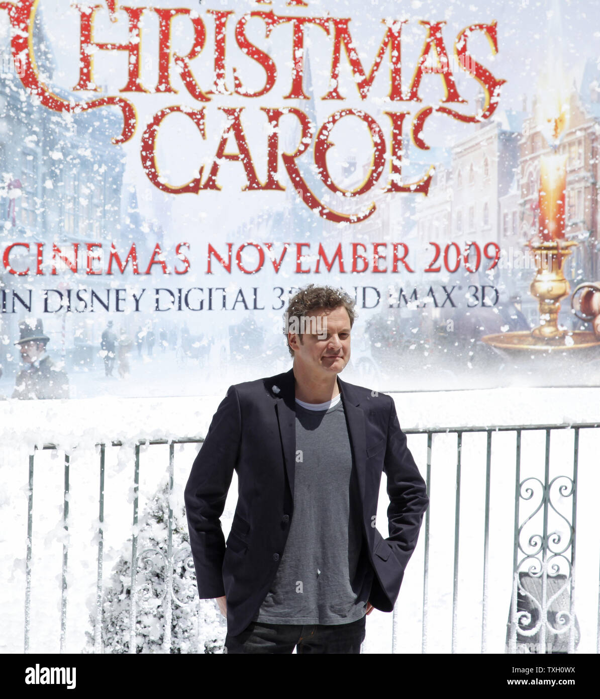 Actor Colin Firth arrives at a photocall for the film "A Christmas ...