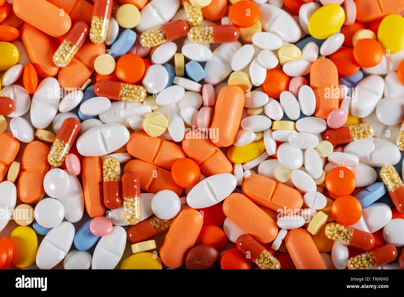 Colorful tablets and pills background Stock Photo - Alamy