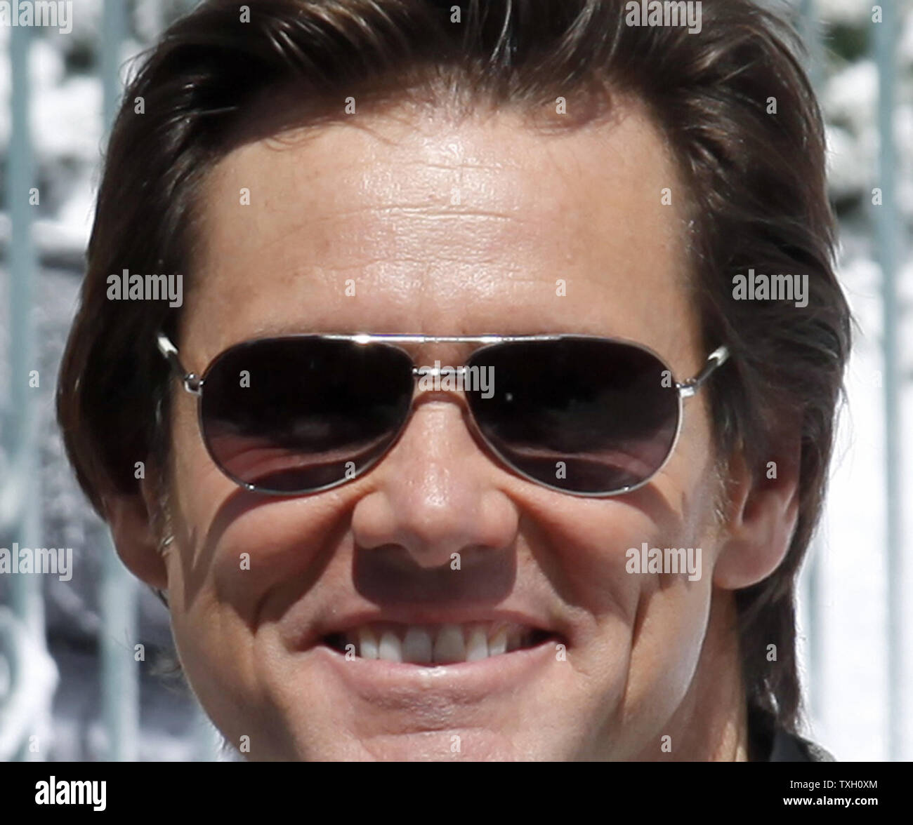 Actor Jim Carrey arrives at a photocall for the film "A Christmas Carol ...