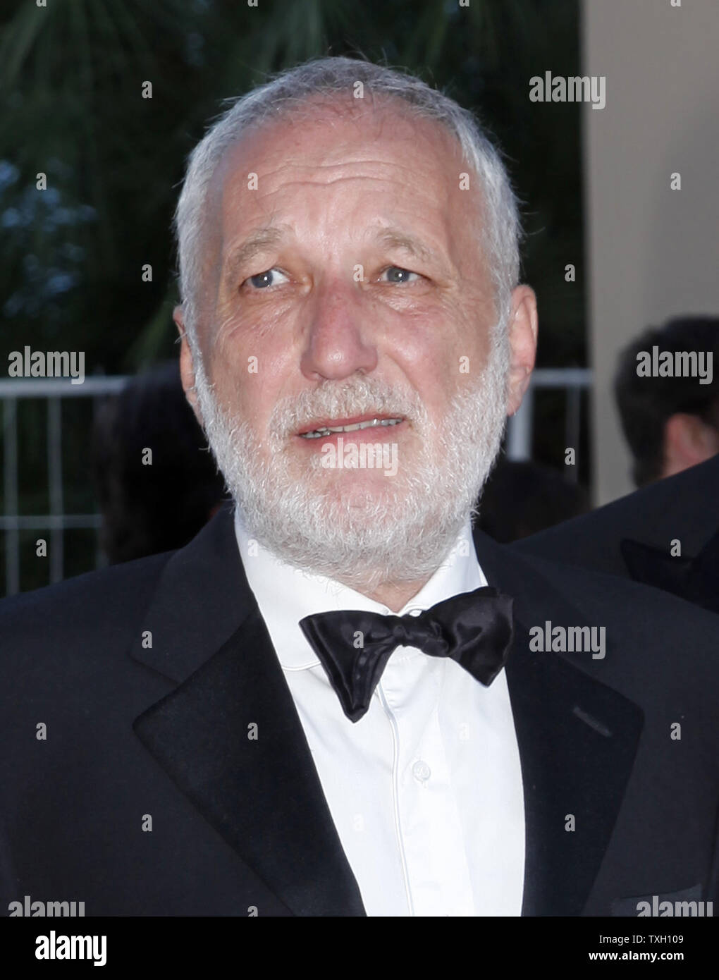 Actor Francois Berleand arrives on the red carpet before a screening of ...