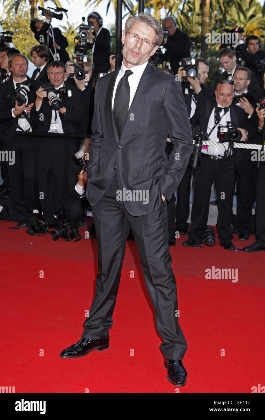 Actor Lambert Wilson arrives on the red carpet before a screening of ...