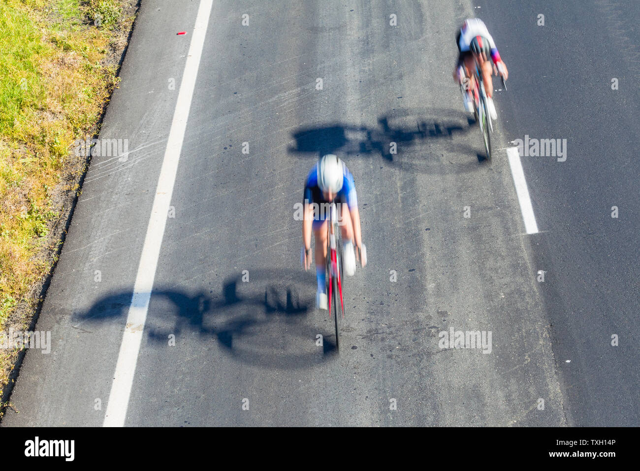 Cycling Cyclist road race riding overhead photo of motion speed blur ...