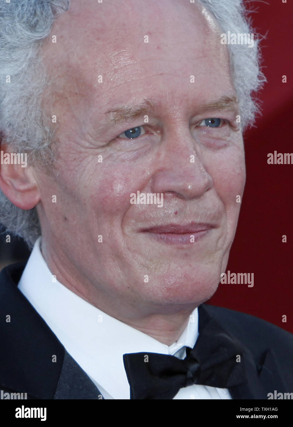 Director Luc Dardenne arrives on the red carpet before a screening of ...