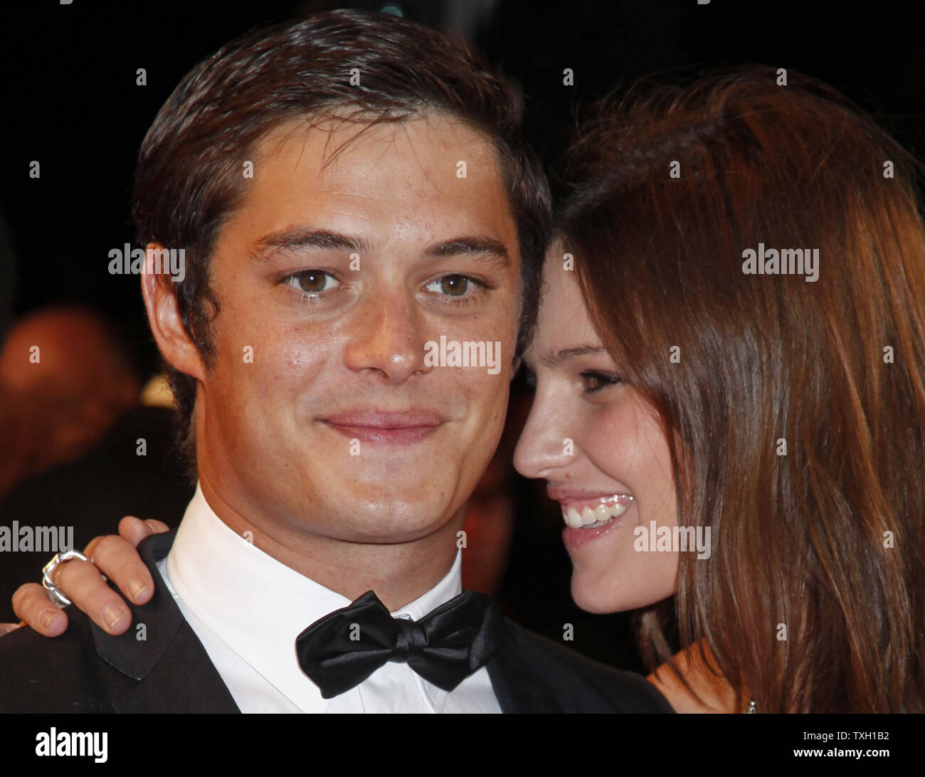 Actor Aurelien Wiik and guest arrive on the red carpet before a ...