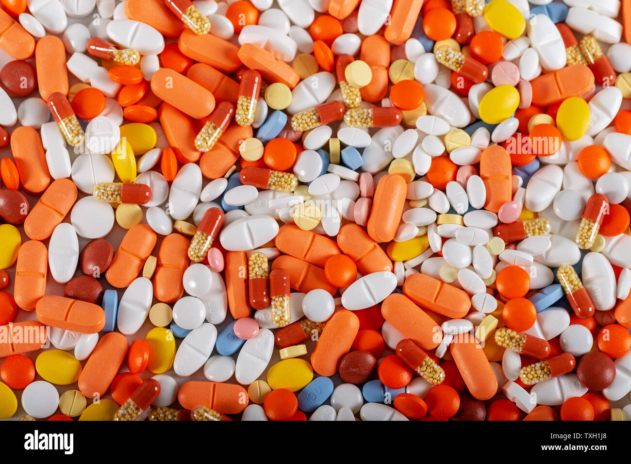 Colorful tablets and pills background Stock Photo - Alamy