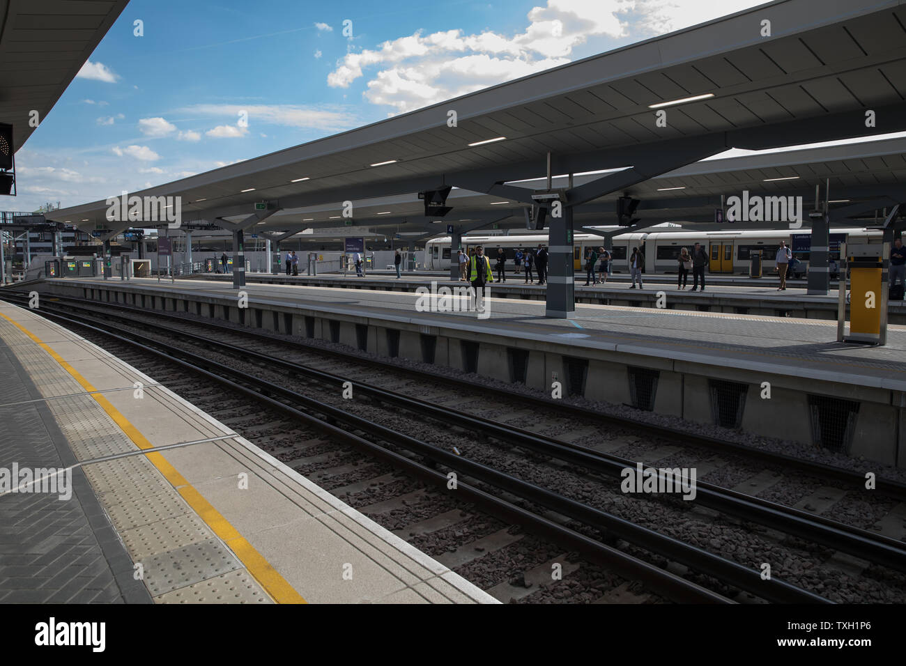 Blue skies over platforms at London Bridge Station. The station was ...