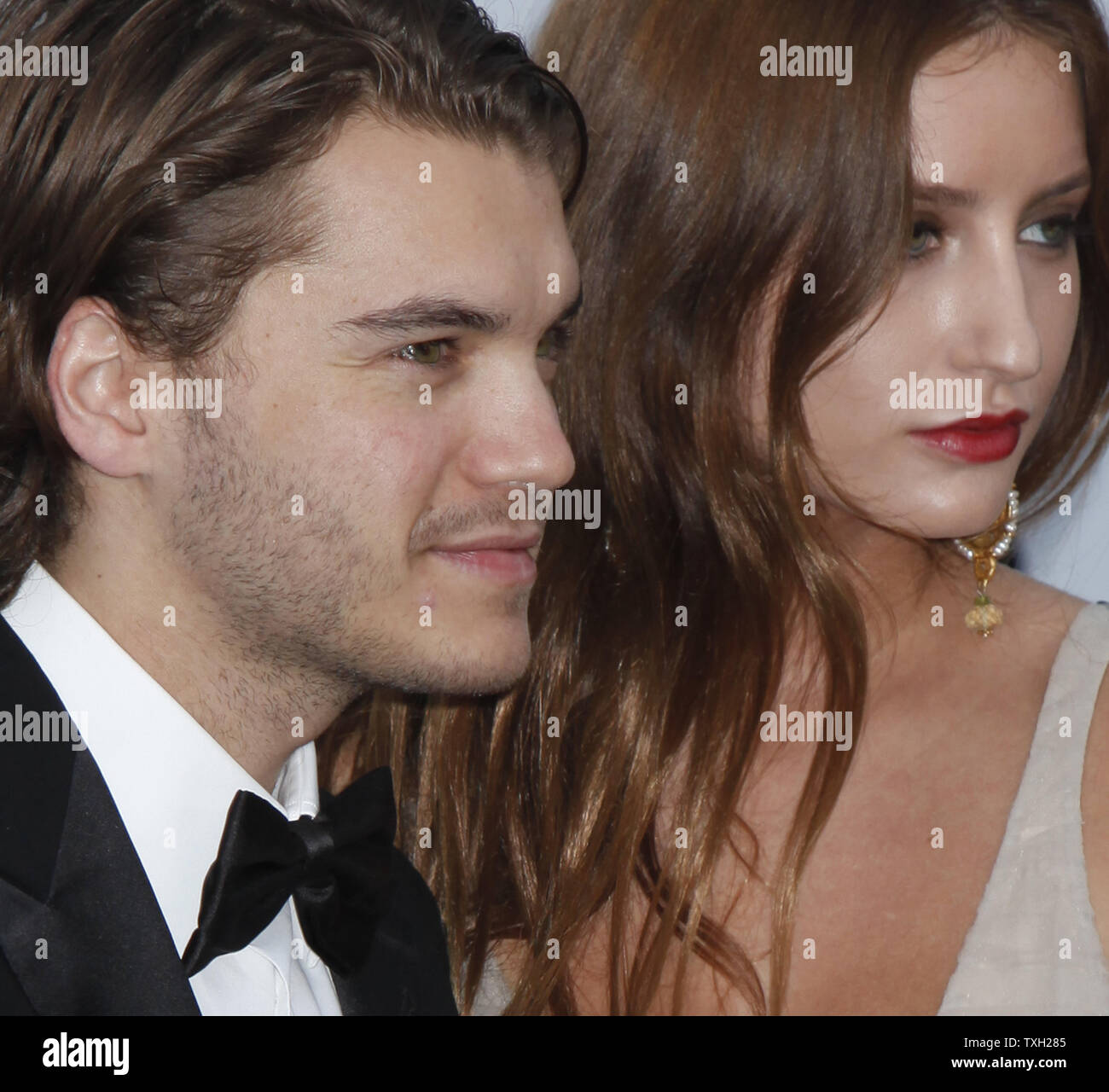 Actor Emile Hirsch and girlfriend Brianna Domont arrive at the amfAR ...