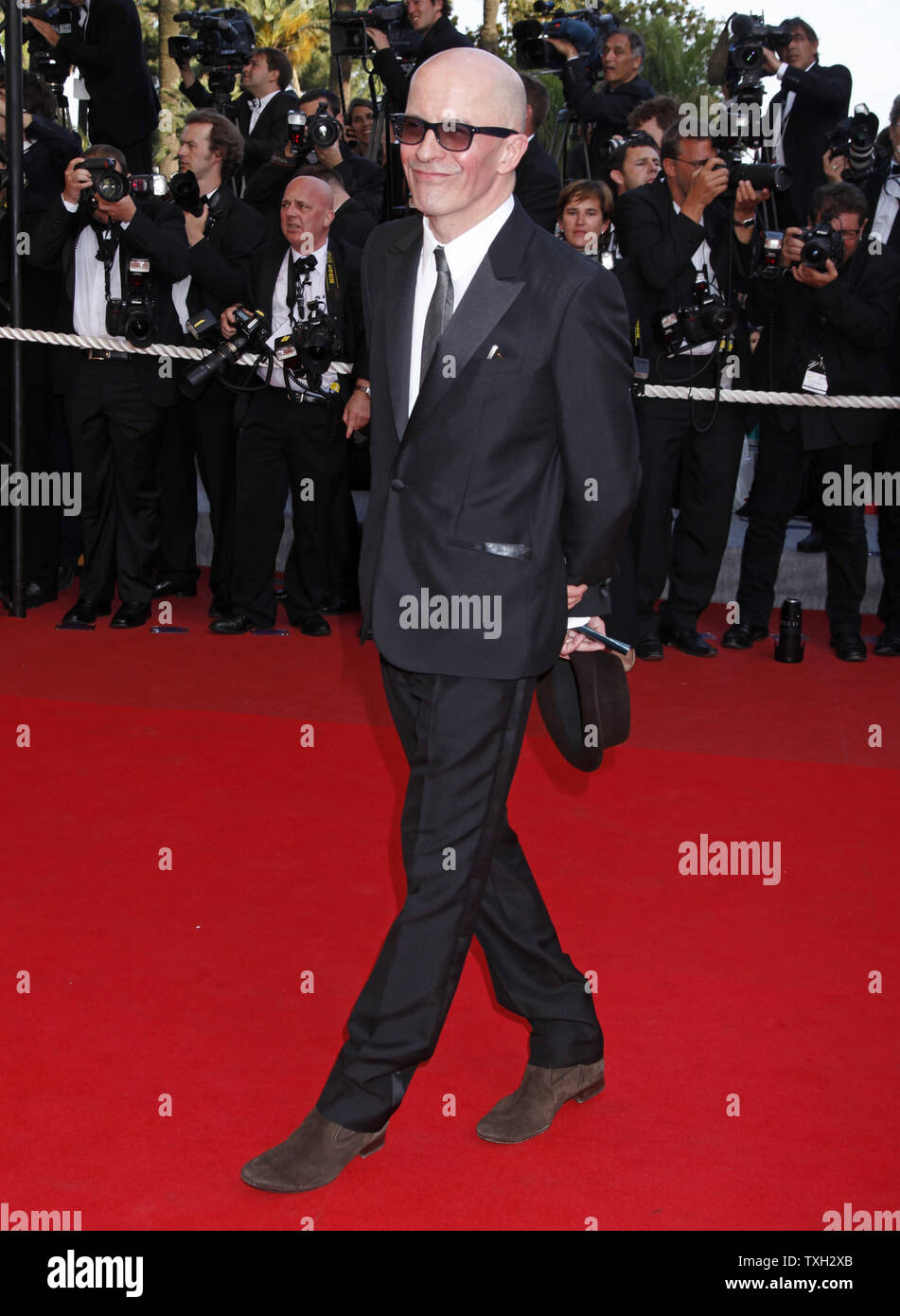 Director Jacques Audiard arrives on the red carpet before the closing ...