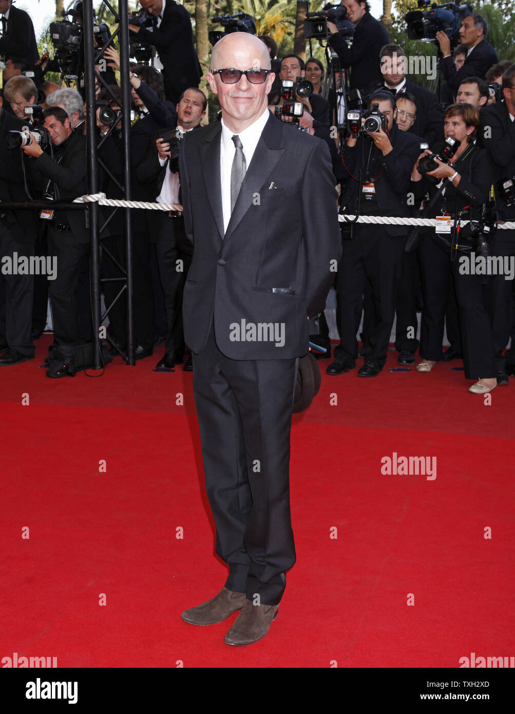 Director Jacques Audiard arrives on the red carpet before the closing ...
