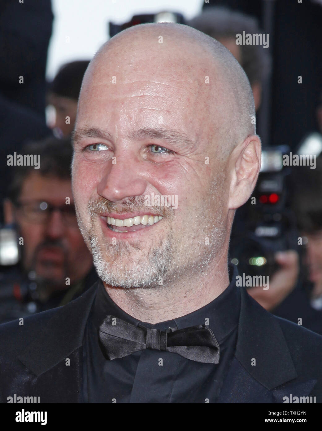 Director Jan Kounen arrives on the red carpet before the premiere of ...