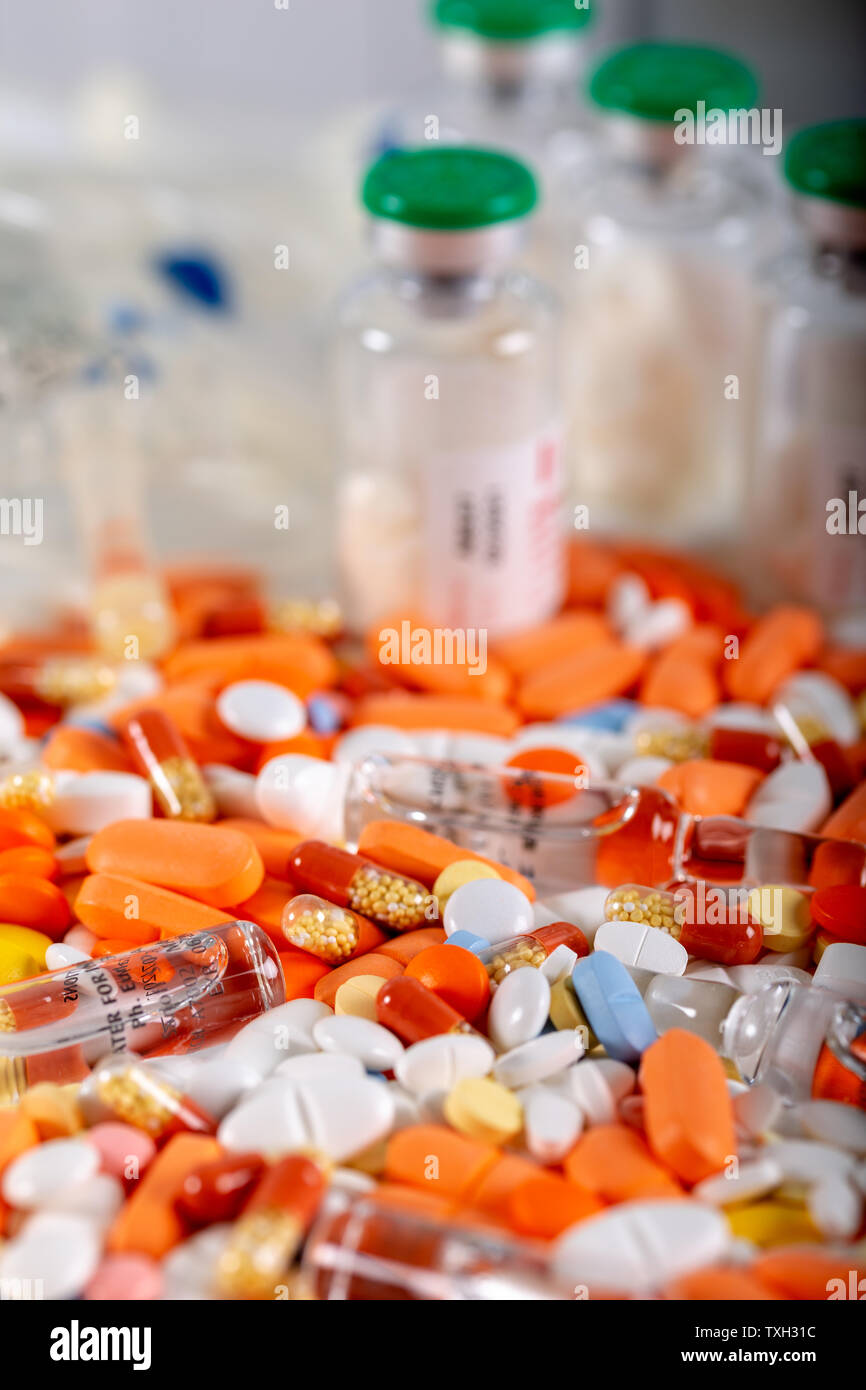Colorful tablets and pills background Stock Photo - Alamy
