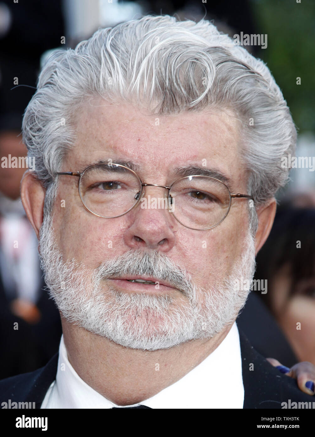 George Lucas arrives on the red carpet before the screening of the film ...