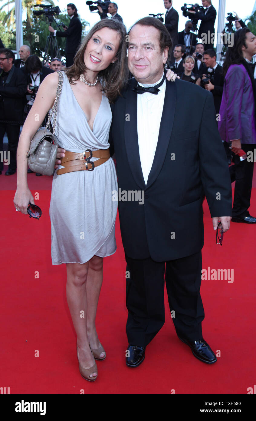 Paul-Loup Sulitzer and guest arrive on the red carpet before the ...