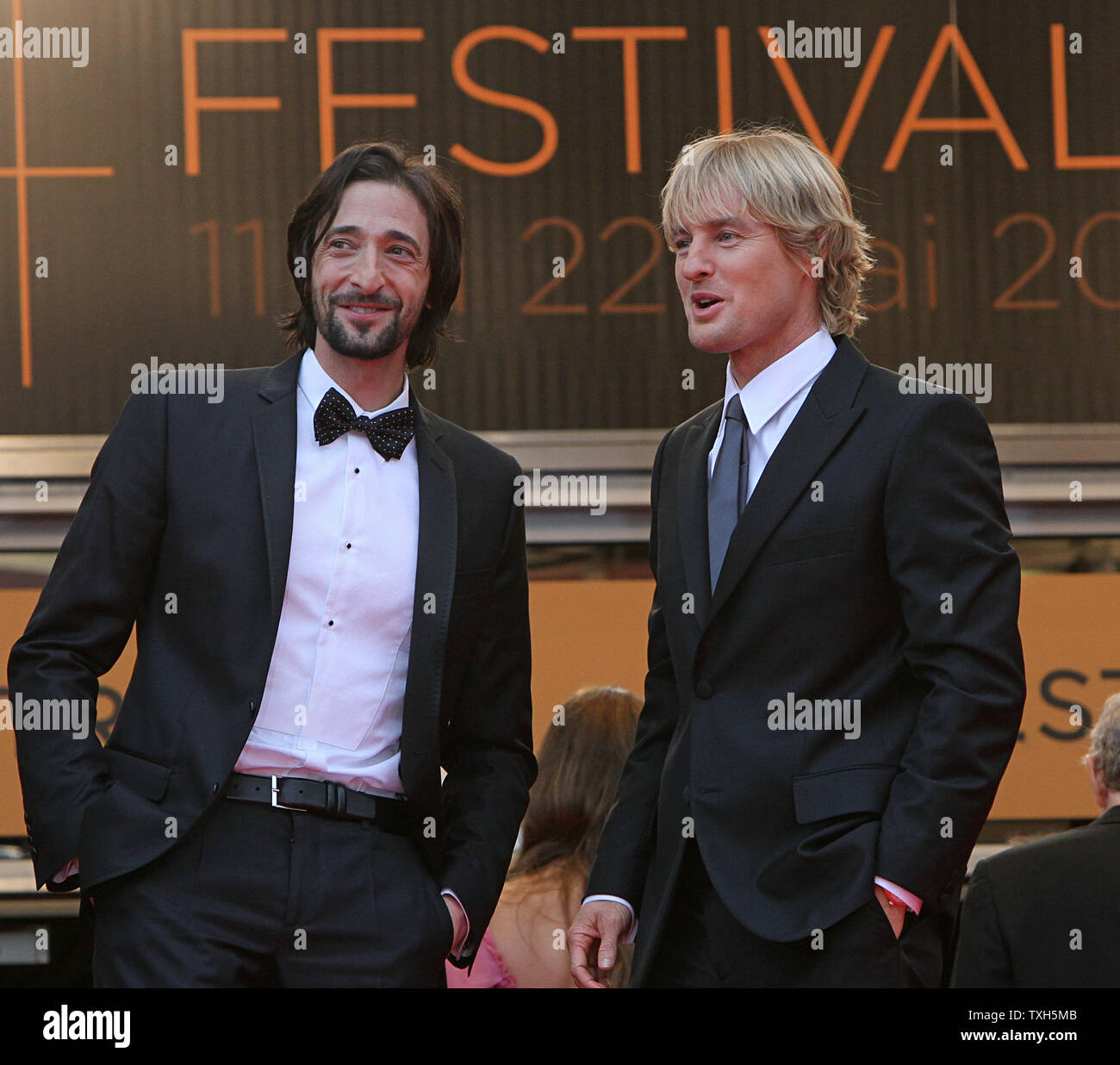 Adrien Brody (L) and Owen Wilson arrive on the red carpet before the ...
