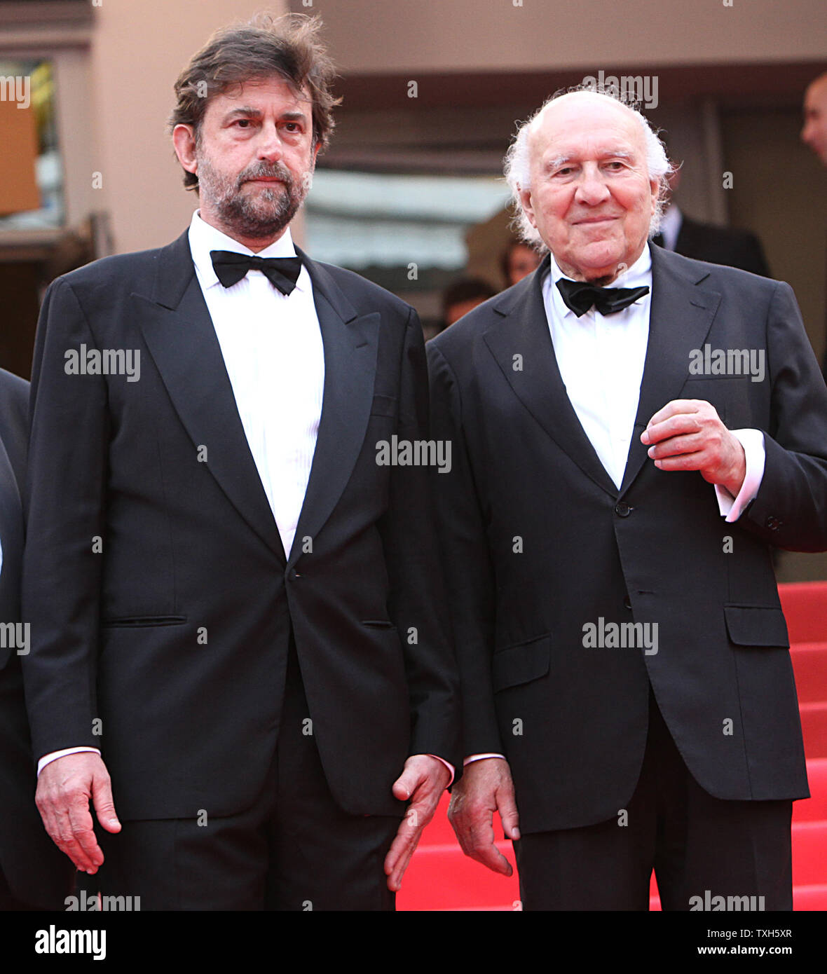 Nanni Moretti (L) and Michel Piccoli arrive on the red carpet before ...