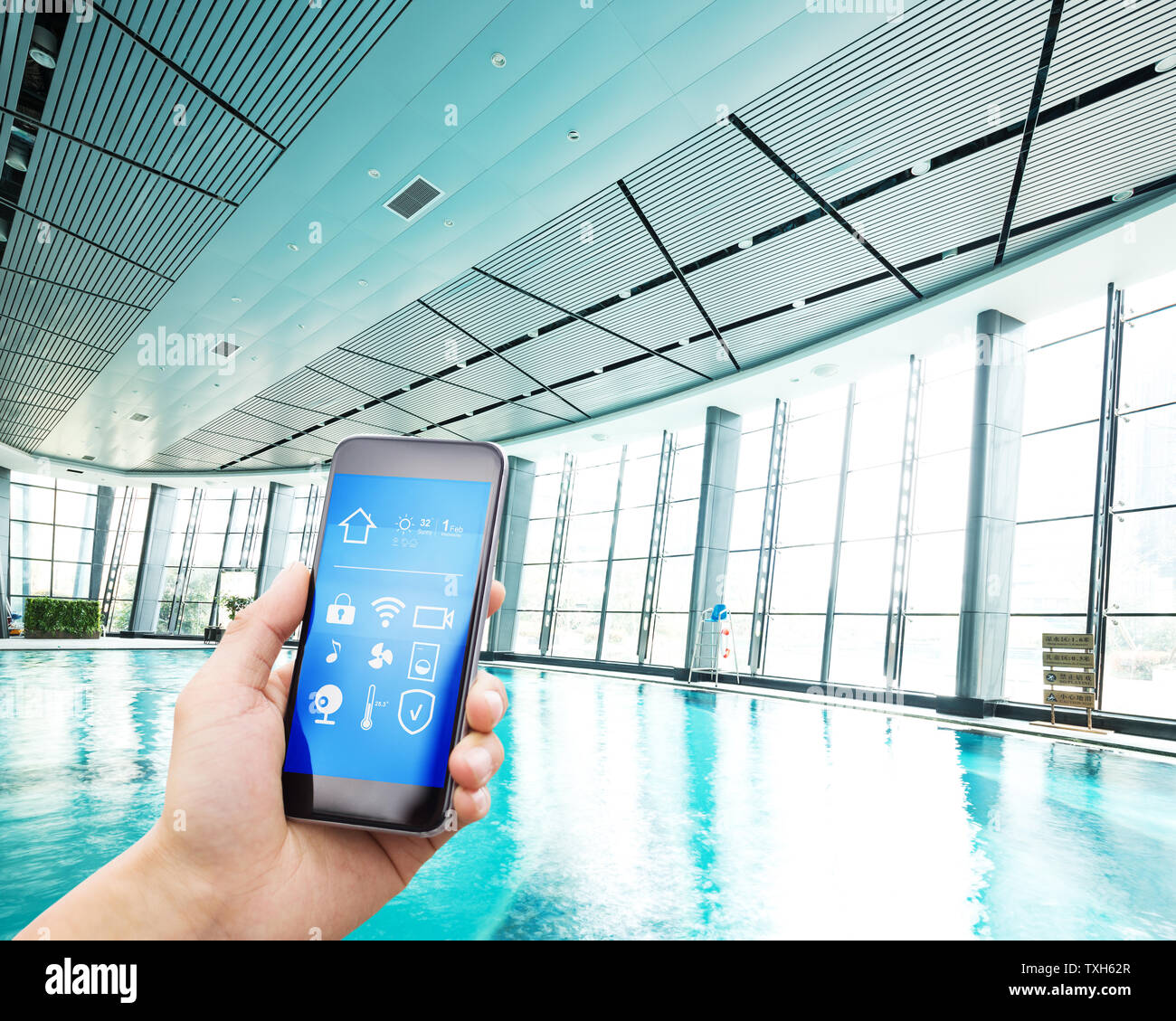 smart phone with smart home with modern swimming pool Stock Photo - Alamy