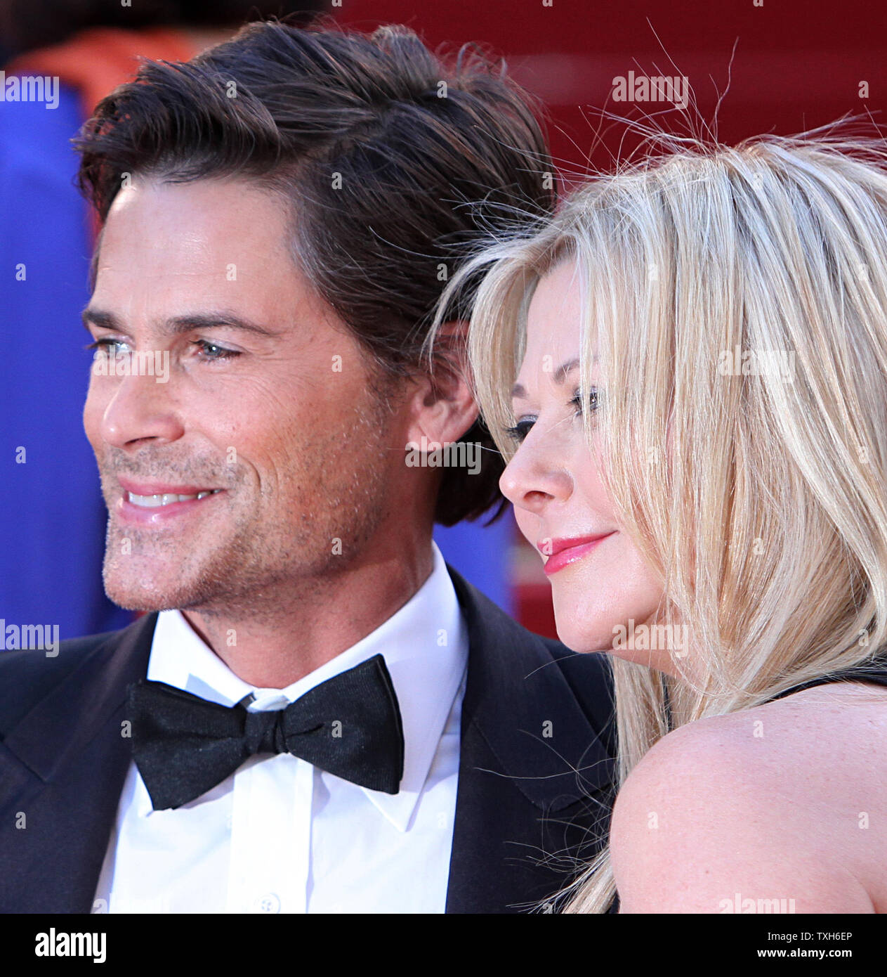 Rob Lowe and his wife Sheryl Berkoff arrive on the red carpet before ...