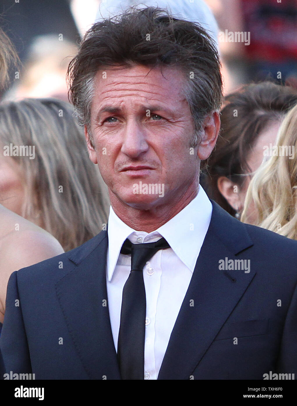 Sean Penn arrives on the red carpet before the screening of the film ...
