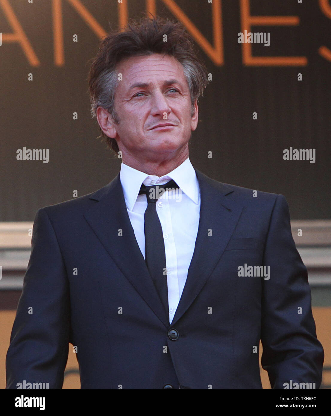 Sean Penn arrives on the red carpet before the screening of the film ...