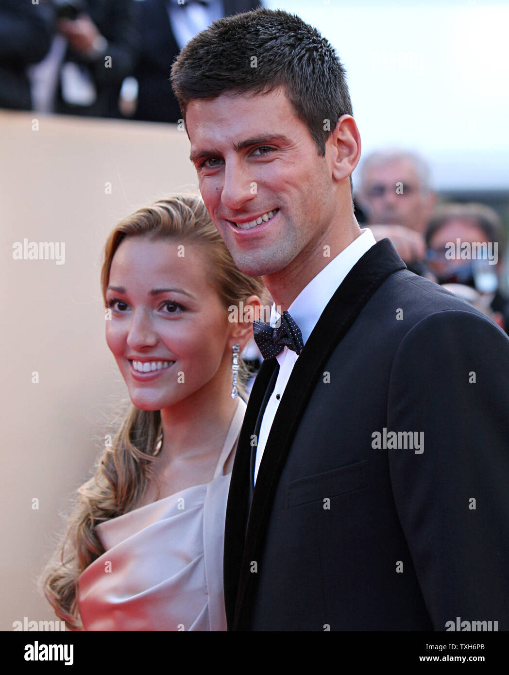 Novak Djokovich (R) and Jelena Ristic arrive on the red carpet before ...