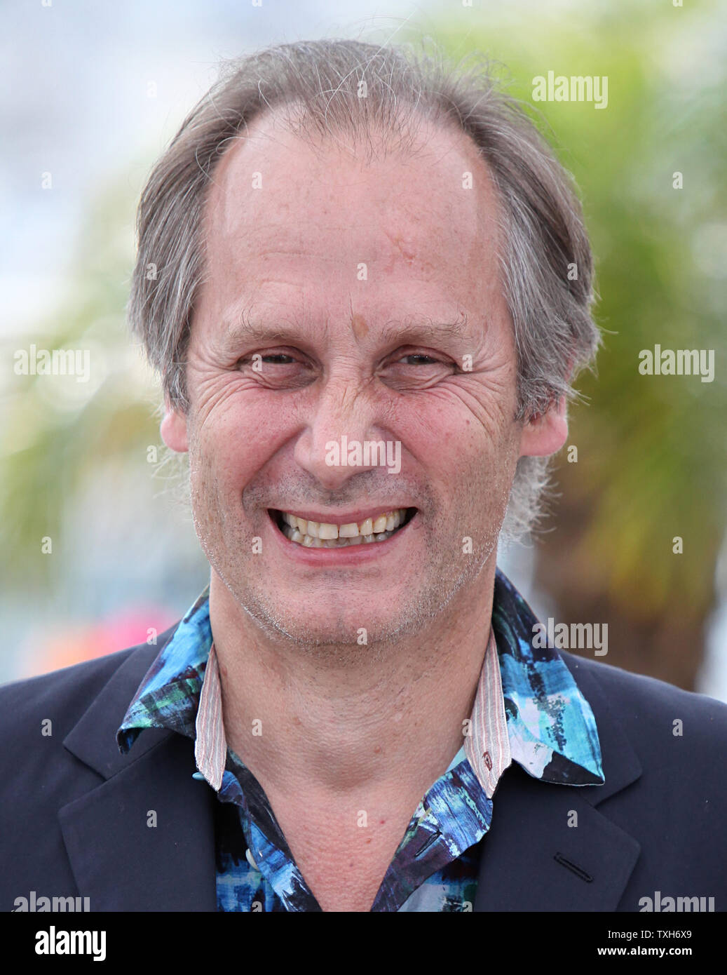 Hippolyte Girardot arrives at a photocall for the film "La Conquete ...