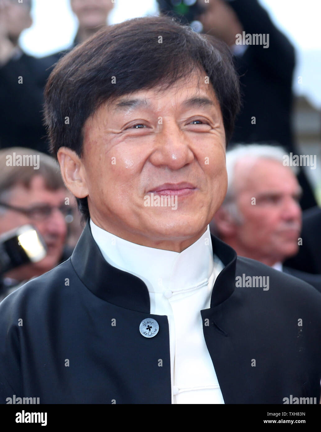 Jackie Chan arrives on the red carpet before the screening of the film ...