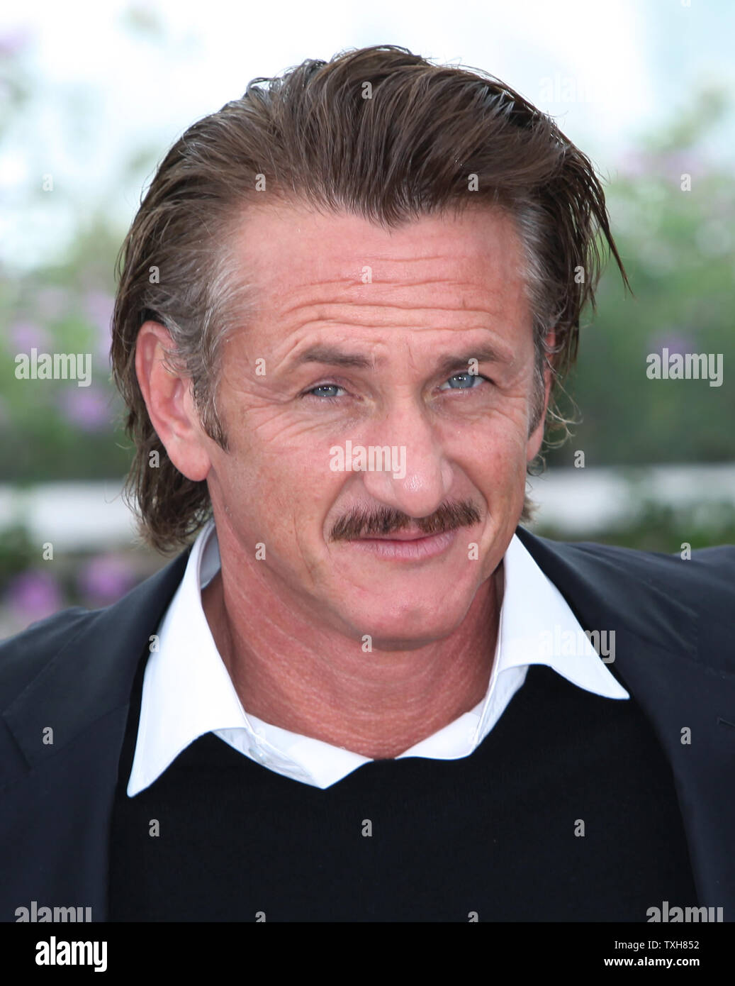 Sean Pean arrives at a photocall for the "Haiti Carnaval in Cannes ...