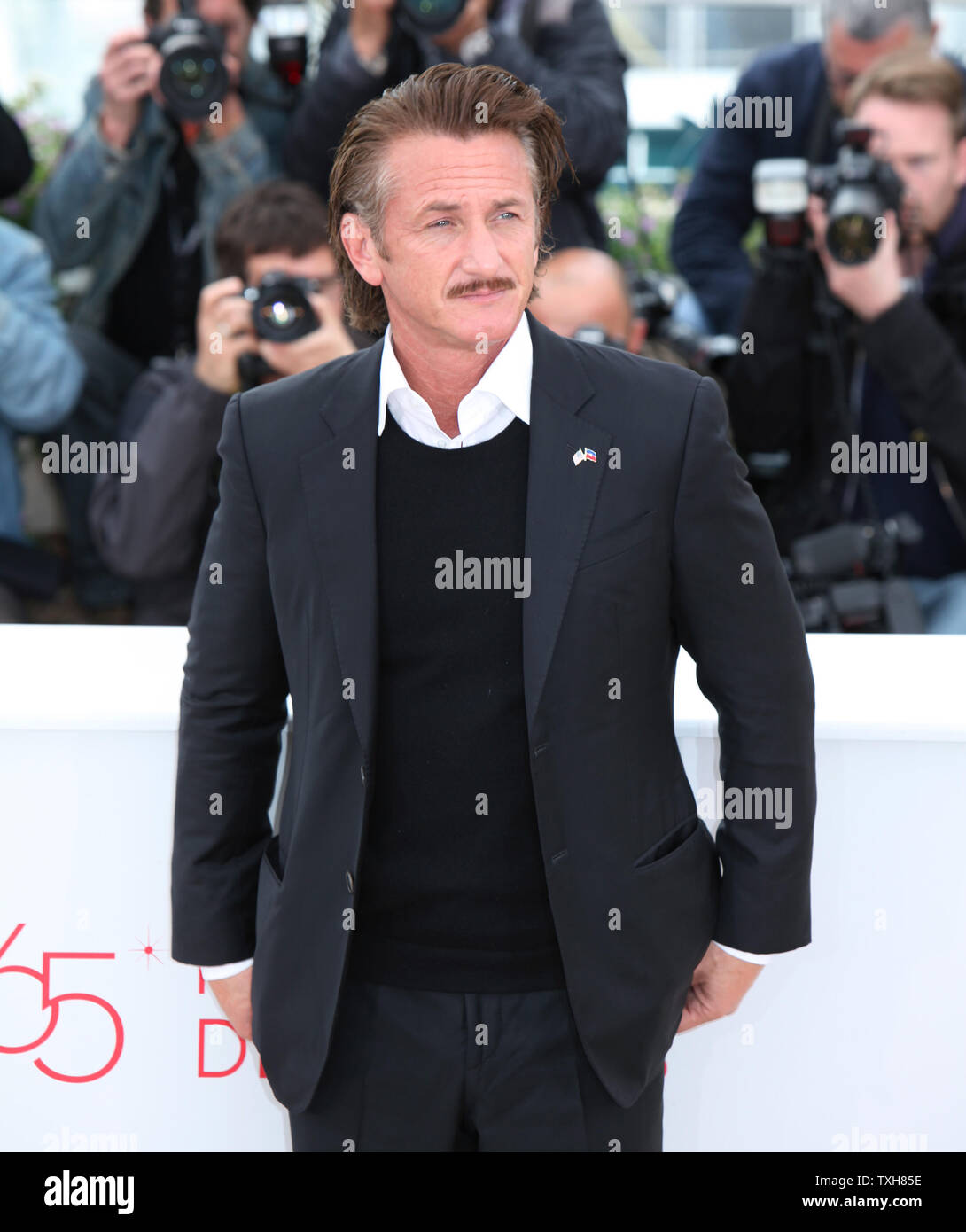 Sean Pean arrives at a photocall for the "Haiti Carnaval in Cannes ...