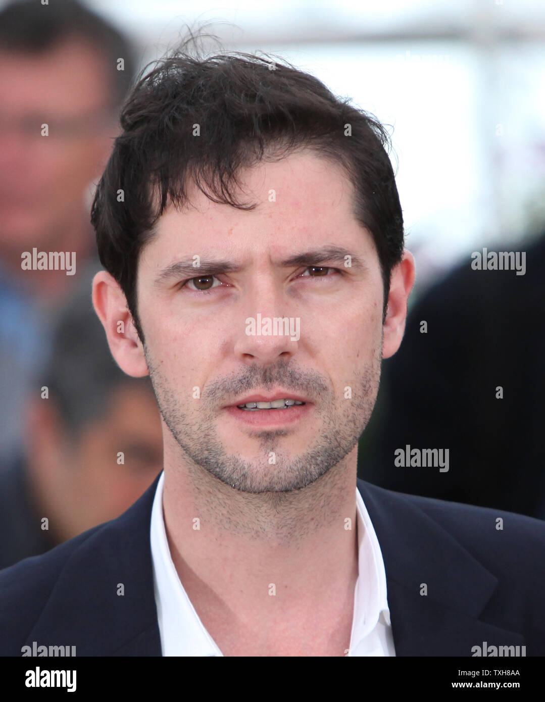 Melvil Poupaud arrives at a photocall for the film "Laurence Anyways ...