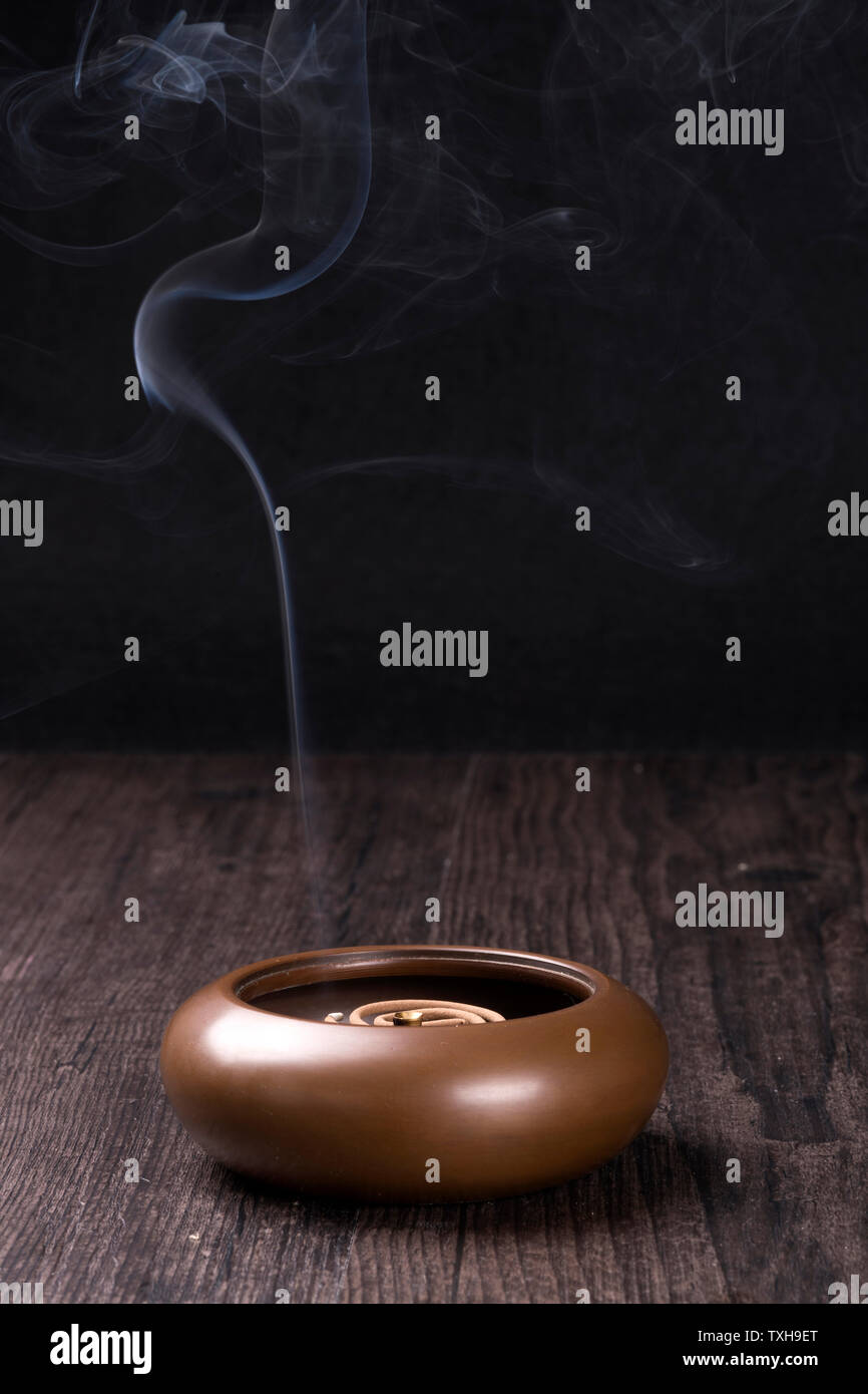 Copper incense stove Stock Photo - Alamy