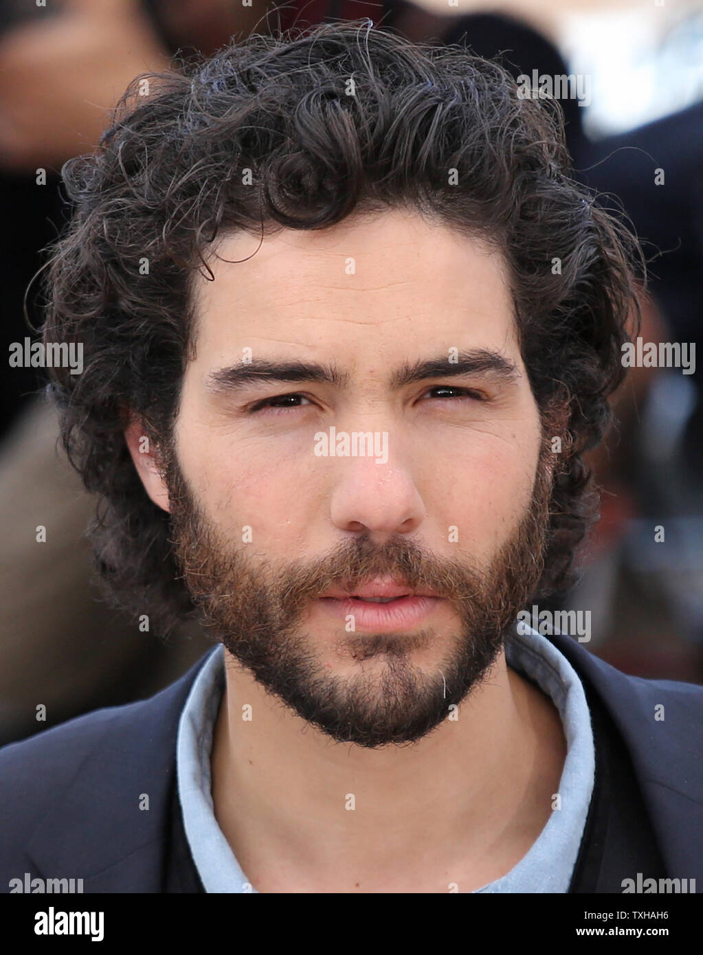 Tahar Rahim arrives at a photocall for the film "Le Passe (The Past ...